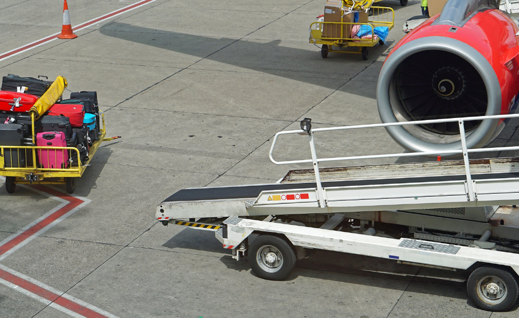 What happens to baggage during long transit layovers?